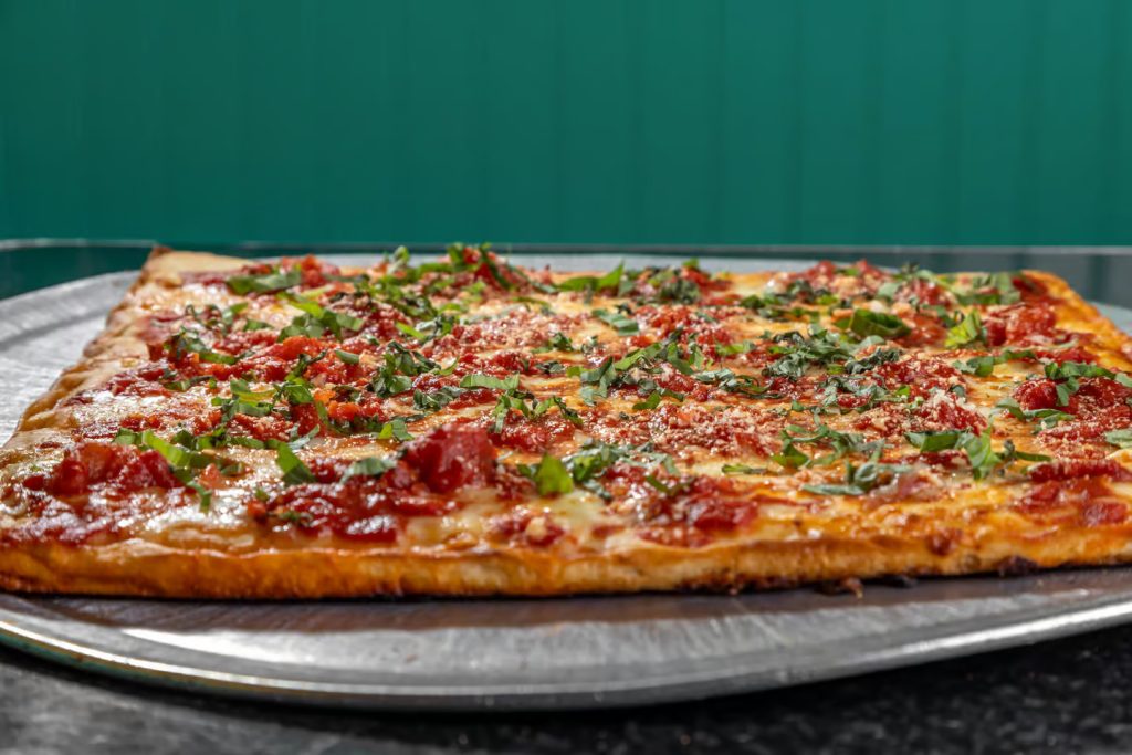 Pizza New York Style: The Evolution of an Iconic Slice | Two Boots ...